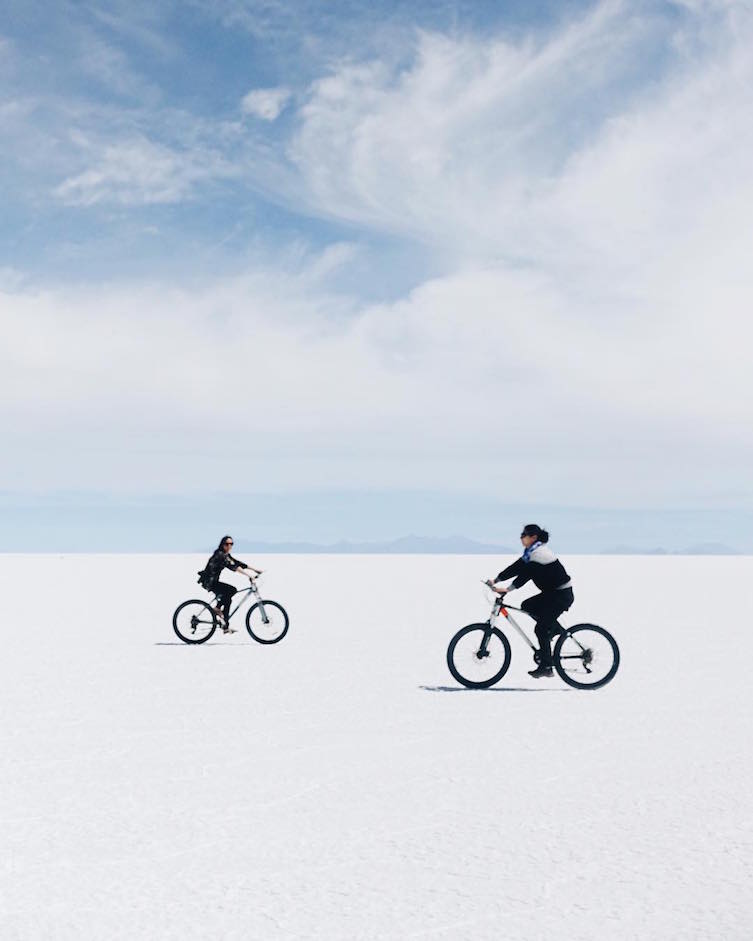 Biking Salt Flats Bolivia CupofTJ - Kara and Nate